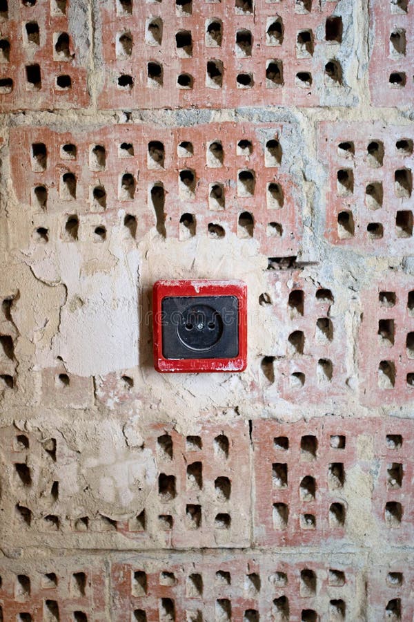 EU Power Outlet Type C, Electric Point of Power at Home, on a Red Brick ...