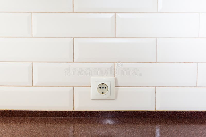 EU Socket on the Wall of Tiled Tiles in the Kitchen Stock Photo - Image ...