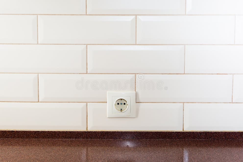 EU Socket on the Wall of Tiled Tiles in the Kitchen Stock Photo - Image ...