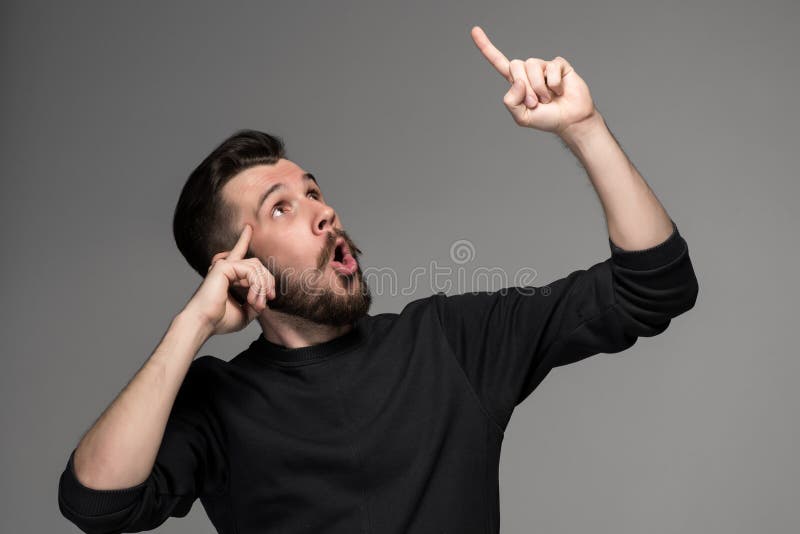Eureka. Man with an Idea Raising His Finger in the Stock Photo - Image ...