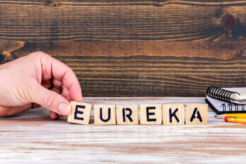 Eureka. Wooden Letters on the Office Desk Stock Image - Image of genius ...