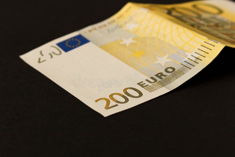 200 Euro Banknote on a Dark Background. Close Up Stock Image - Image of ...