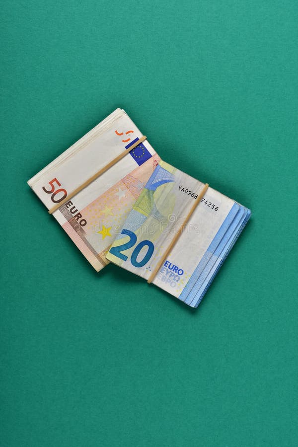 Euro banknote on green stock photo. Image of pile, background - 114647332
