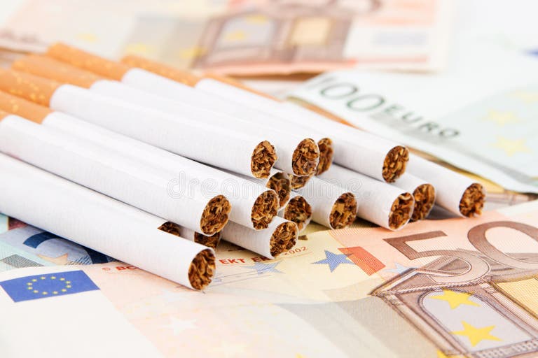 Euro Banknotes with Cigarettes Stock Photo - Image of cigarettes, green ...