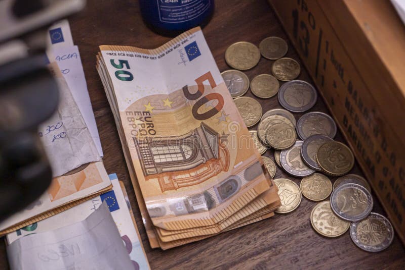 Euro Banknotes and Coins Placed on the Table Stock Photo - Image of ...