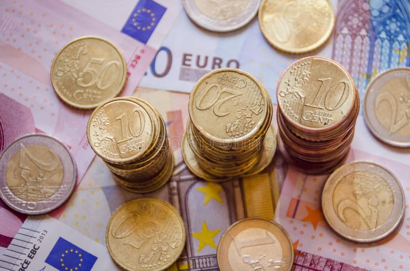 Euro banknotes and coins stock photo. Image of dollar - 39983524