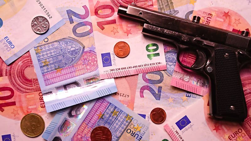 Euro banknotes with a gun stock photo. Image of coins - 122377672