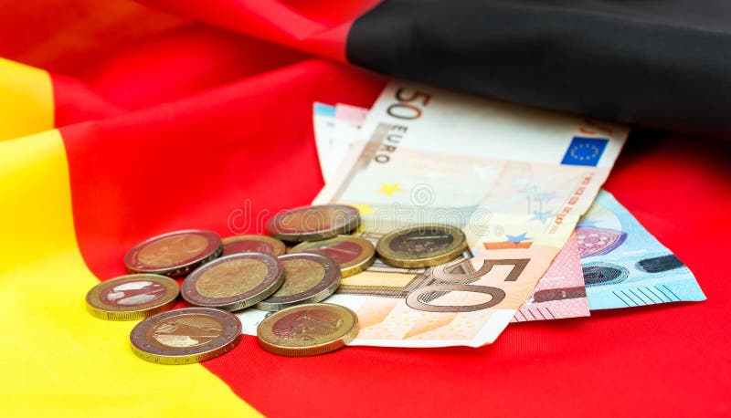 Euro Bills with Coins on German Flag Stock Photo - Image of banknote ...