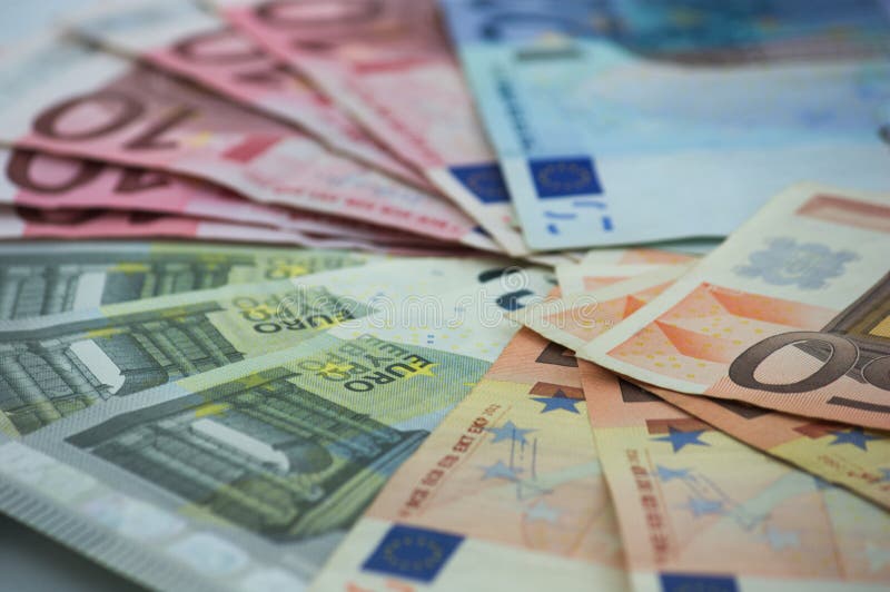 Several Euro Currency Bills on Top of a Table Forming a Circle Stock ...