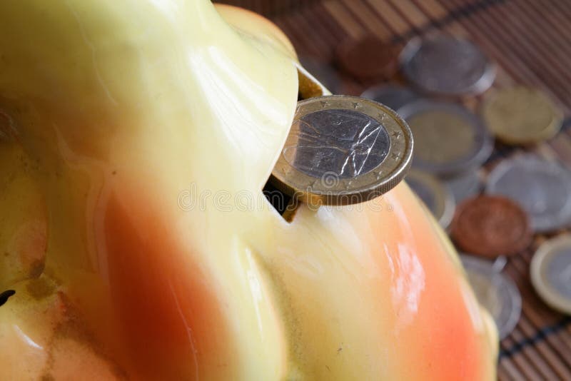 Euro Coin with a Denomination of 1 Euro in Hole of Moneybox, Coins ...