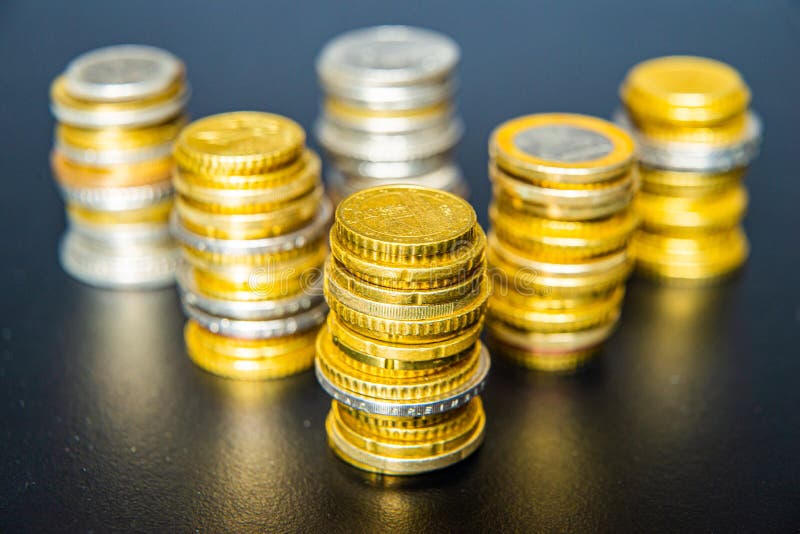 Euro coins on dark table stock photo. Image of anot - 180141978