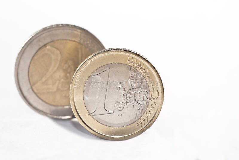 Two Euro coin in ice cube stock photo. Image of green - 25431486