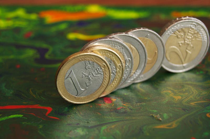 1 Euro and 2 Euro Coins Standing on the Edge. Eurozone Currency. Stock ...