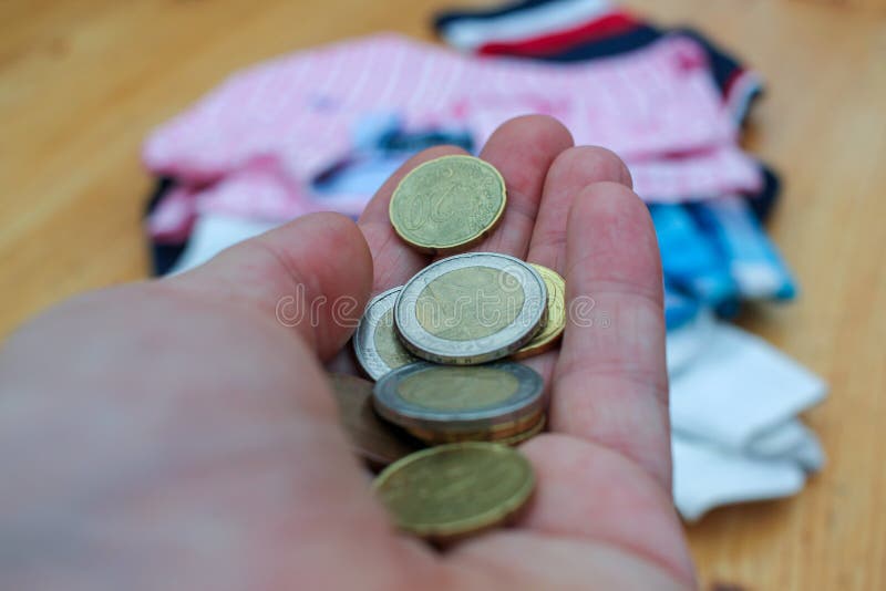 Euro Coins To Pay for Clothes Stock Image - Image of body, debt: 254840647