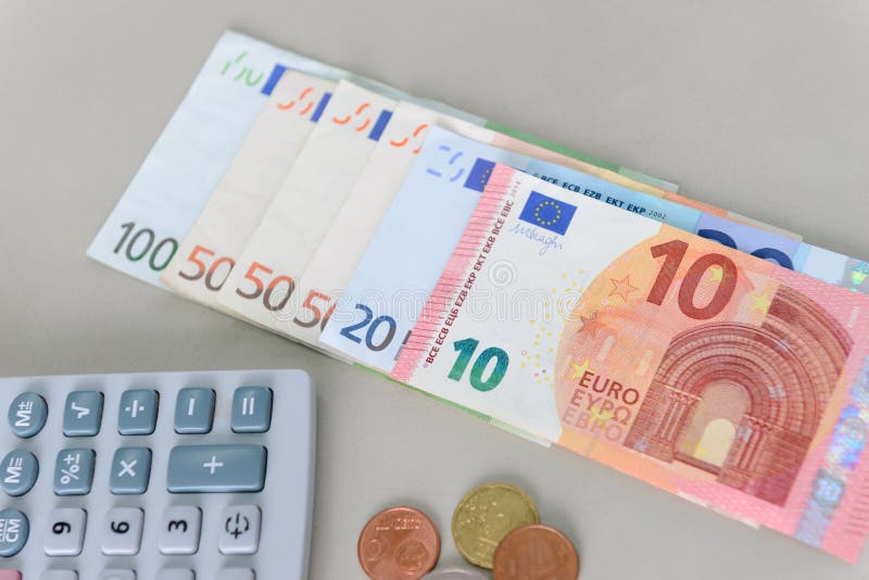 Euro Money Banknotes and Coins Counting with Calculator Stock Image ...