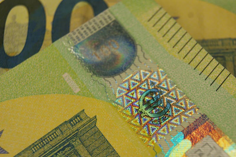 Euro Symbol. a Fragment of a 100 Euro Banknotes with a Hologram. Stock ...