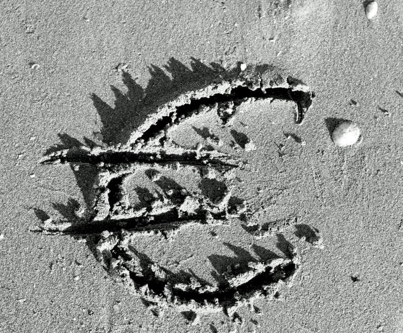 EURO Symbol Written Large on the Sand of the Beach Stock Image - Image ...