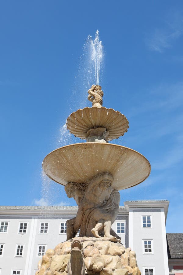 Classic Fountain Art in a Blooming Garden. Stock Image - Image of light ...