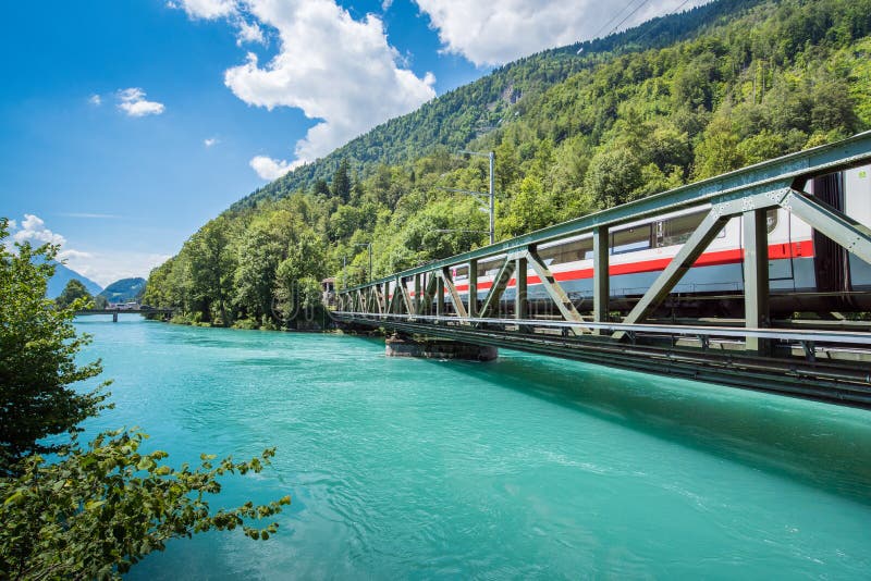 Europe Train in Interlaken Town Over Thunersee River Stock Image ...