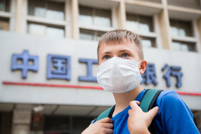 European Boy in a Protective Mask on a Street in Beijing Editorial ... European Boy in a Protective Mask on a Street in Beijing Editorial ...