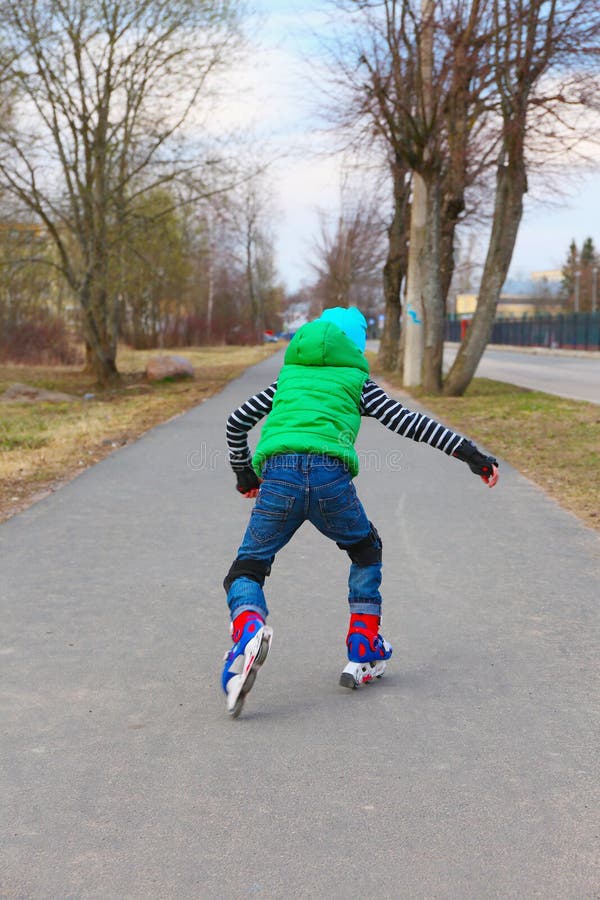 European Boy Riding on Roller Skates Stock Image - Image of protective ...