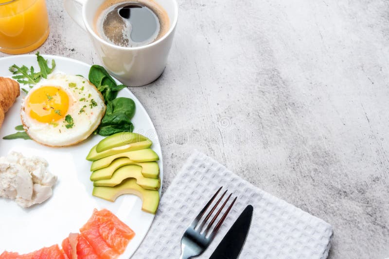 European Breakfast with Croissants and Fish on Marble Background with ...