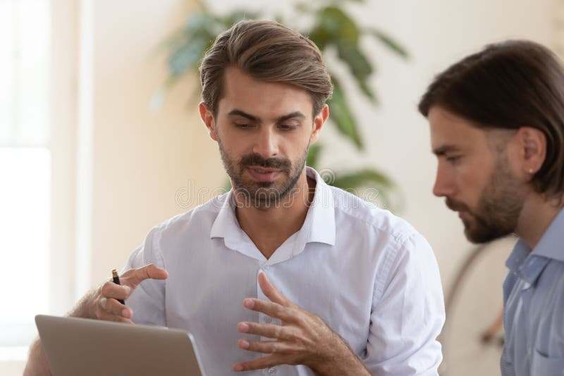 European Confident Executive Manager Makes Presentation for Client Using Notebook Stock Image ...