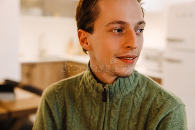 European Ginger Man Smiling and Looking Aside at Home Stock Photo ...
