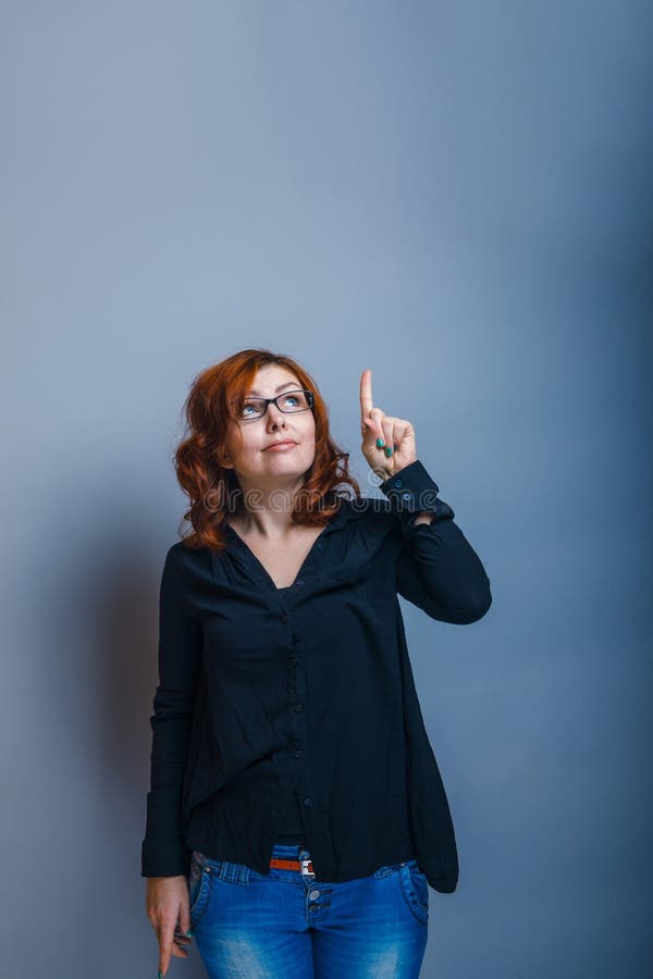 European - Looking Woman of 30 Years is Pointing Stock Photo - Image of ...