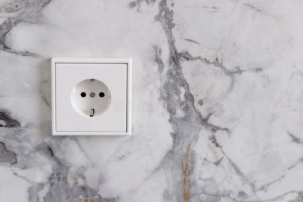 European Socket Seen from the Front Installed on Marble Stock Image ...