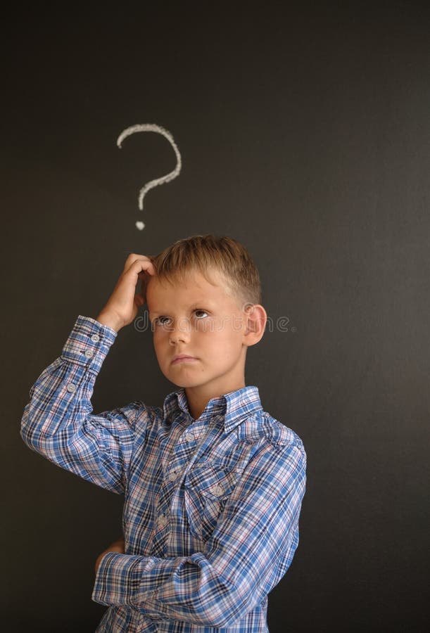 European Student in a Pensive Pose Near the Blackboard Stock Photo ...