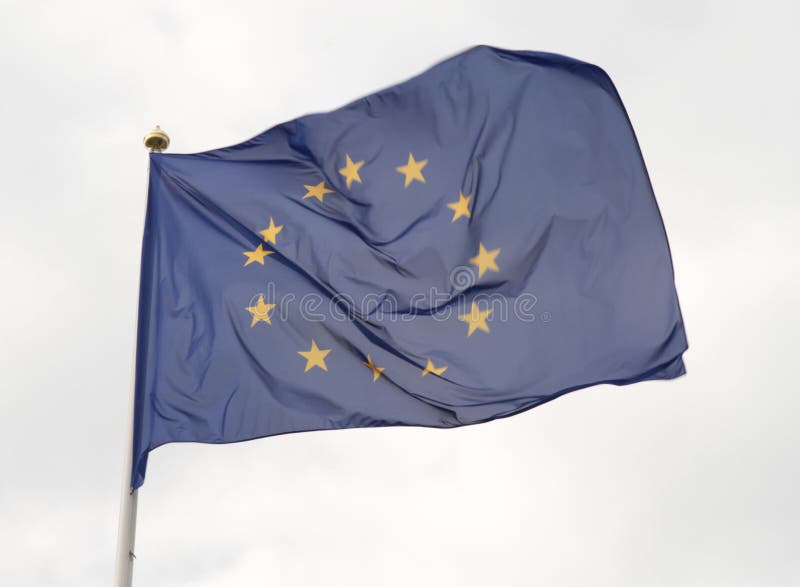 European Union Flag Flying in Front of Bright Blue Sky Stock Image ...