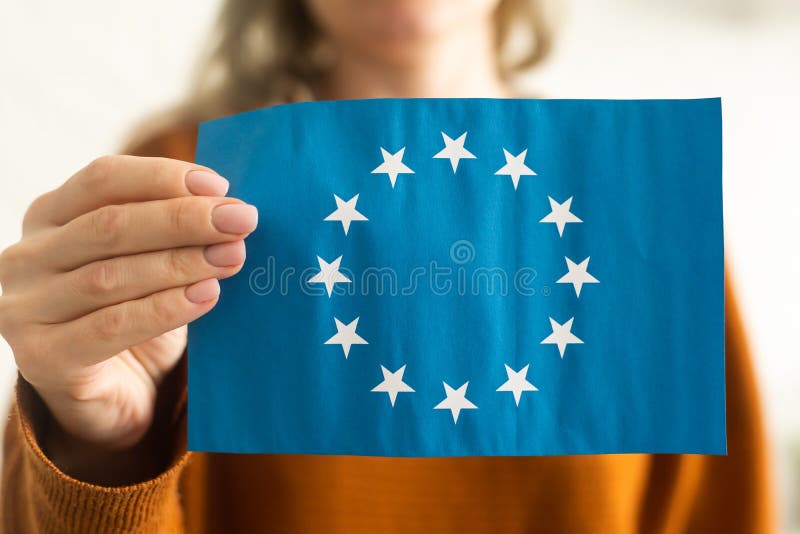 European Union Flag. European Union Flag in Hands Stock Photo - Image ...