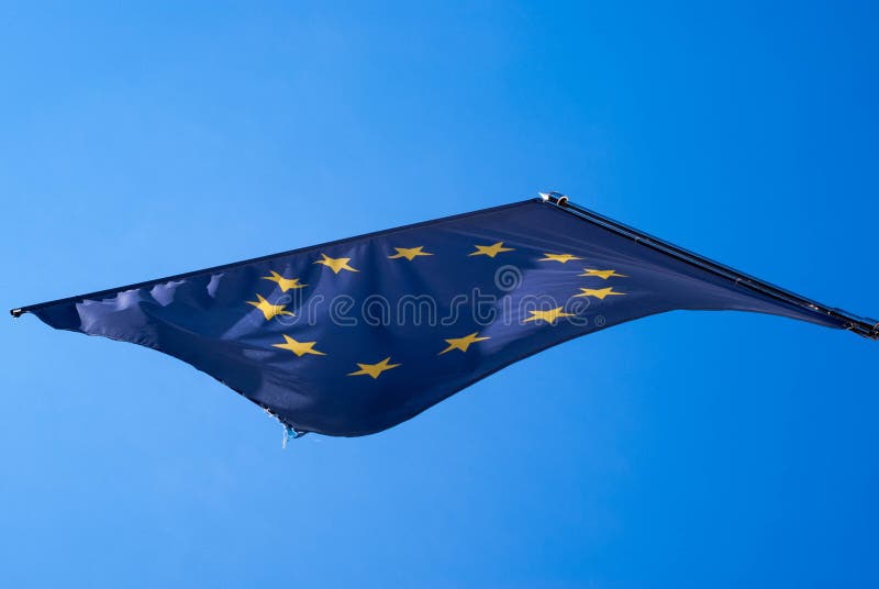 European Union Flag Waving in Front of Blue Sky Stock Image - Image of ...