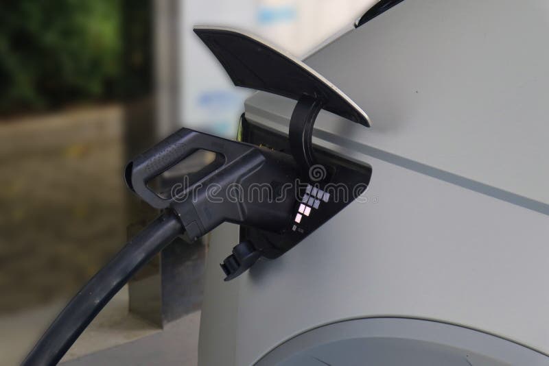 EV Car or Electric Car at Charging Station with the Power Cable Supply ...