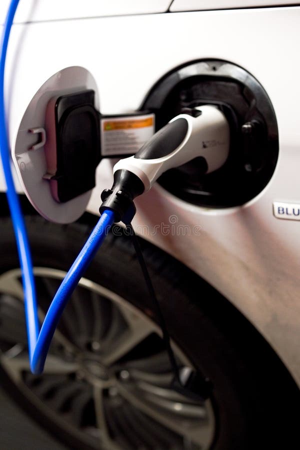 EV plugged in for recharge stock photo. Image of plug - 185832622