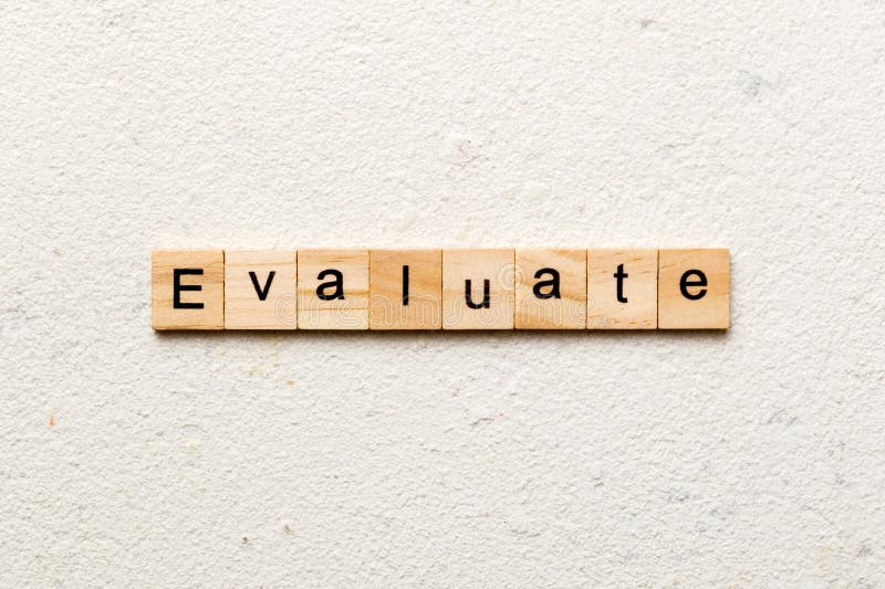 EVALUATE Word Written on Wood Block. EVALUATE Text on Cement Table for ...