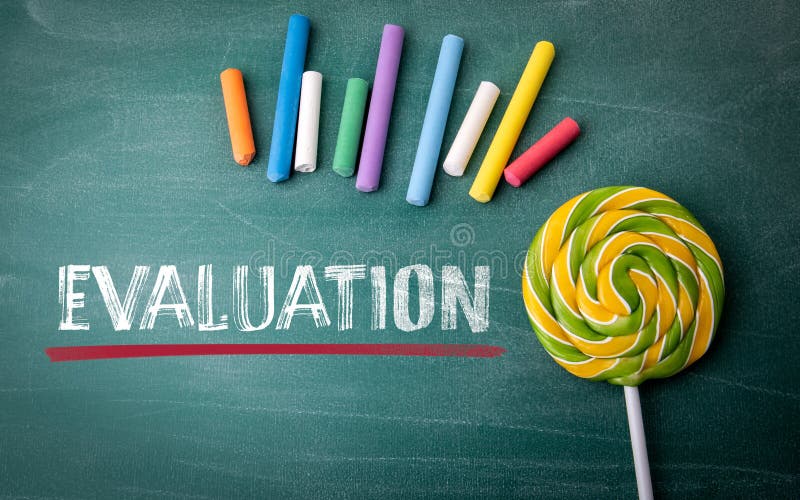 Evaluation. Pieces of Chalk on a Green Chalkboard Background Stock ...