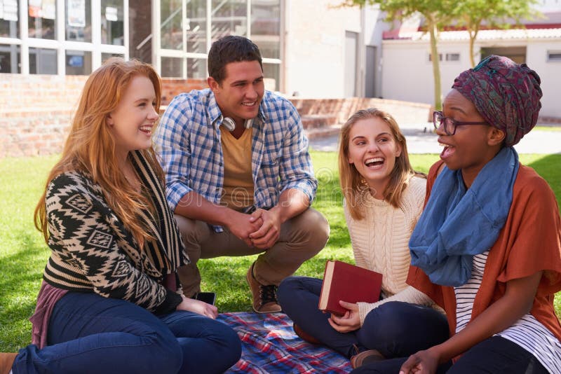 Even on Their Breaks they Make Time for Studying. a Group of Young ...