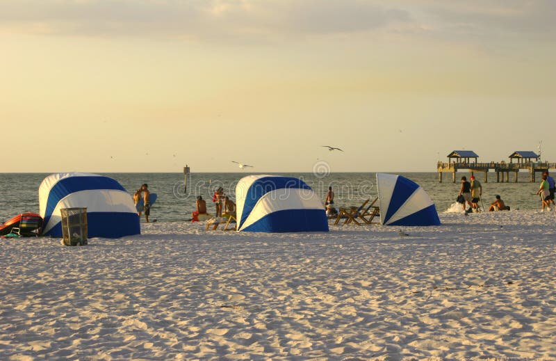 Evening at the beach stock image. Image of tent, shore - 339929