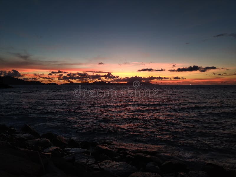 Evening at beach stock photo. Image of cloud, sunshine - 202664430