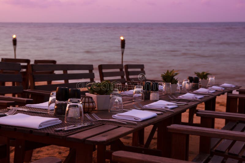 Evening Beach Dinner Serving Stock Image - Image of light, ocean: 86225947