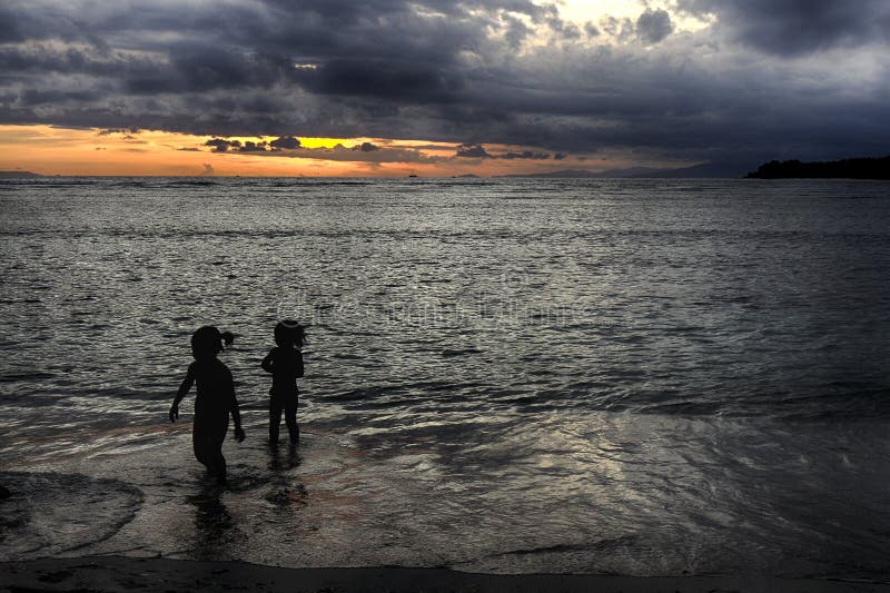 Evening Beach, People Have Fun in the Ocean at Sunset. Stock Image ...