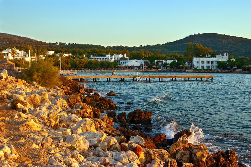 Evening at the Beach Resort Stock Image - Image of landscape, pier ...