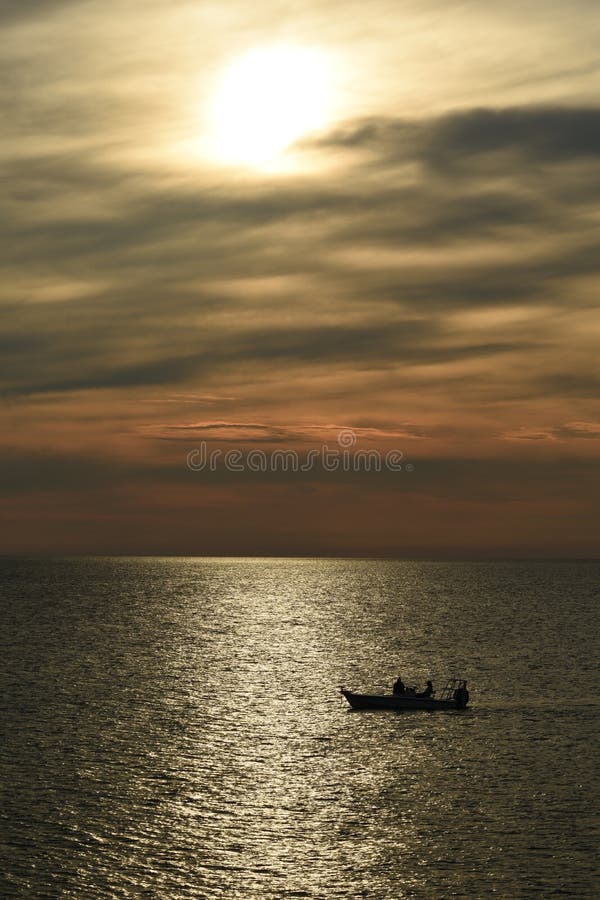 Boating at sunset stock image. Image of motorboat, outdoors - 10309705