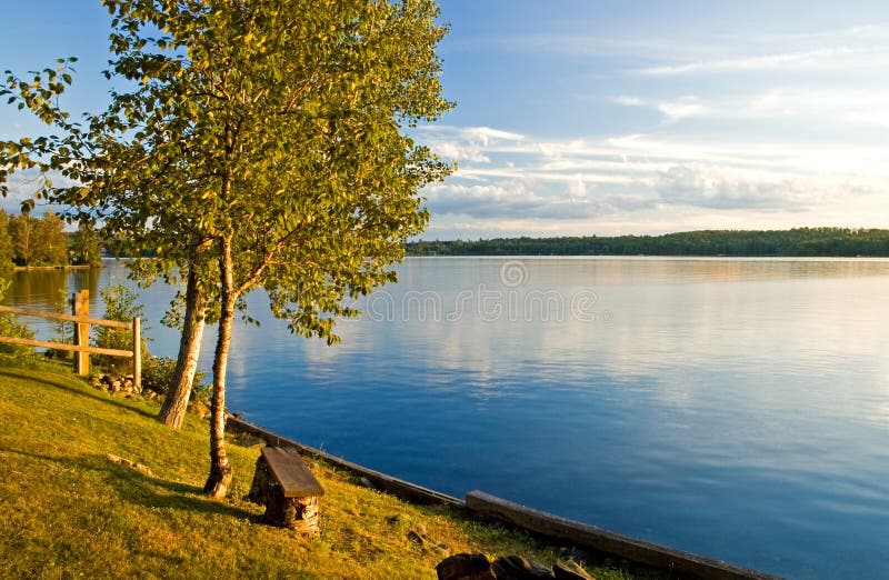 Evening Calm on the Lake stock image. Image of sundown - 1066953