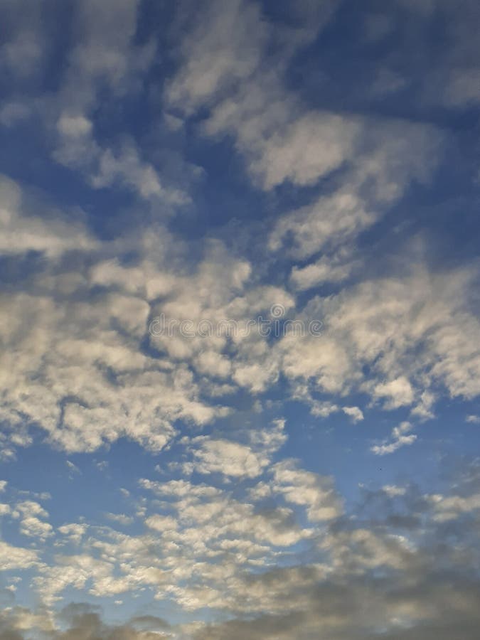 Evening Clouds Drift Overhead Stock Image - Image of evening, blue ...