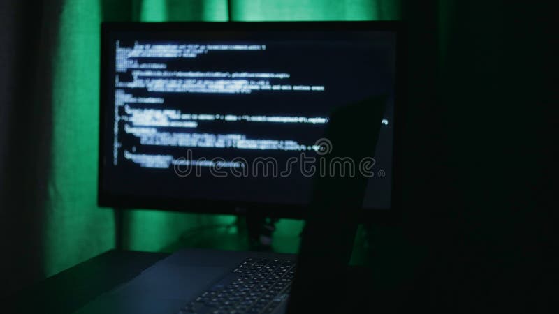 Evening Coding Session with Engaged Programmer in Dim Lighting Environment, Late Night ...