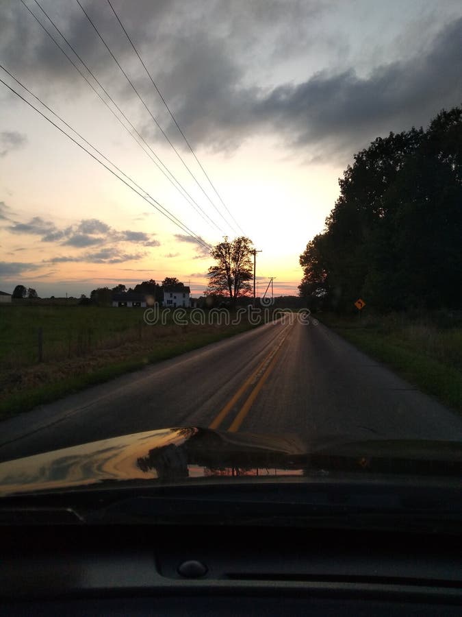 Evening Drive Thru the Park Stock Image - Image of street, shadows ...