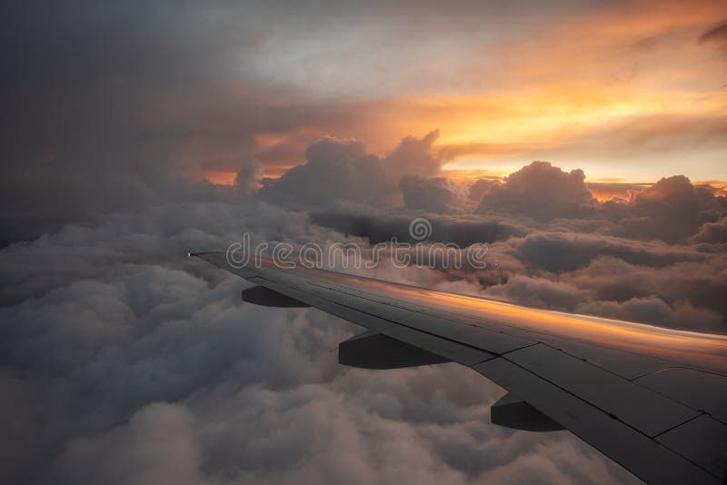 Evening Flight Over Storm Clouds. Flight during a Storm Stock Photo ...